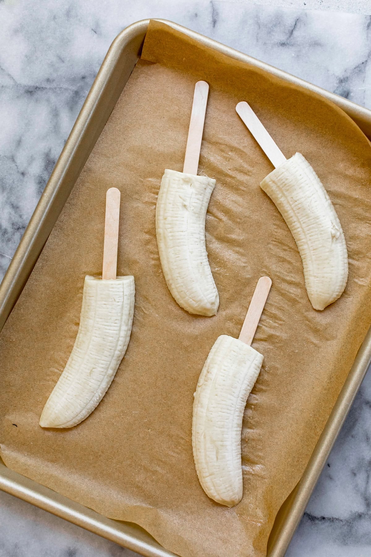 Frozen Chocolate Banana Ghost Pops - The Love Bud